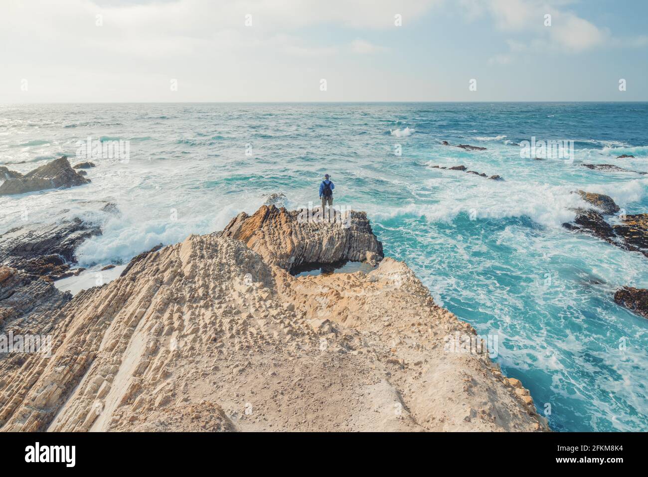 Man sweeping beach hi-res stock photography and images - Alamy