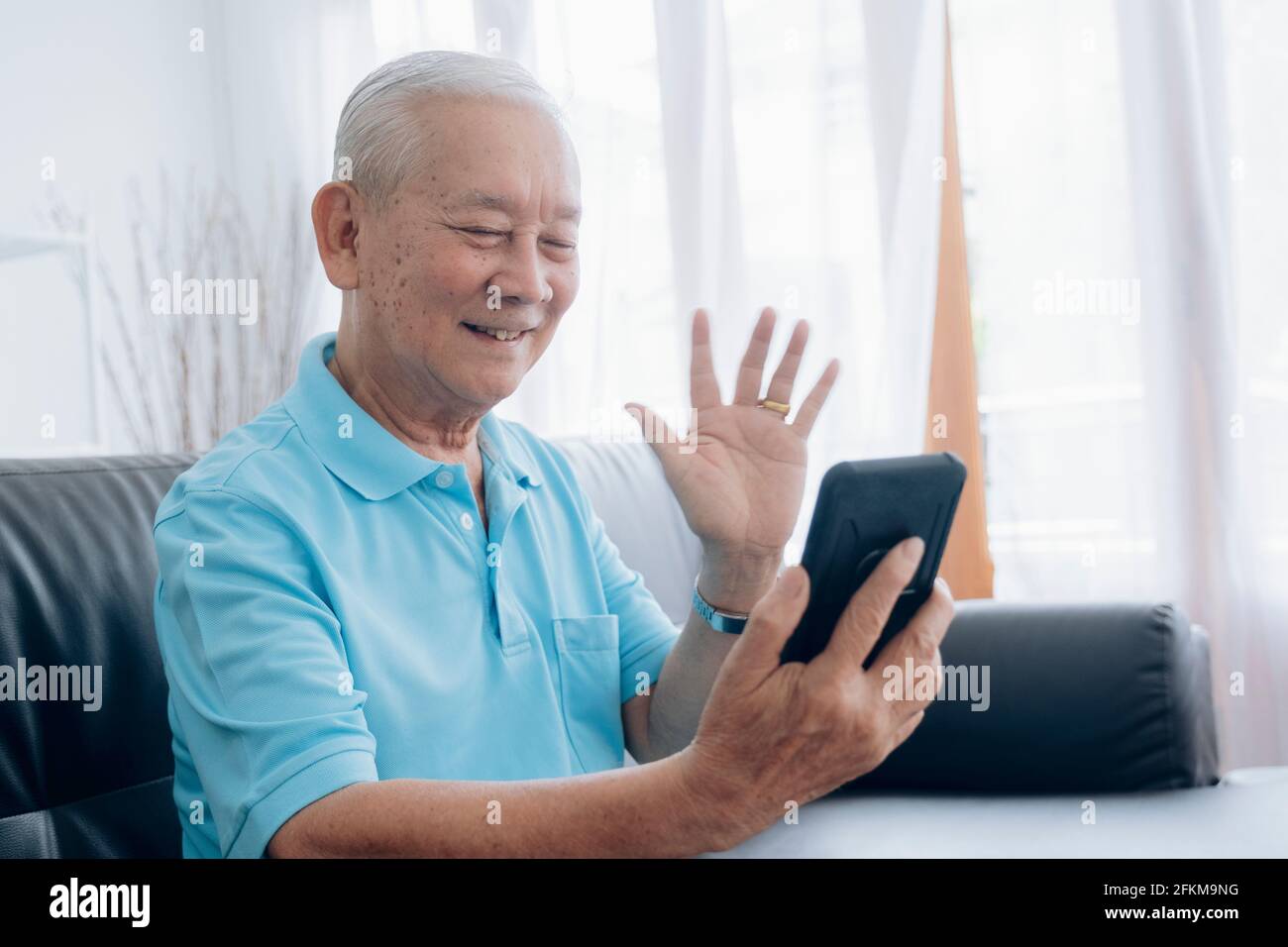 Elderly man making phone call hi-res stock photography and images - Alamy