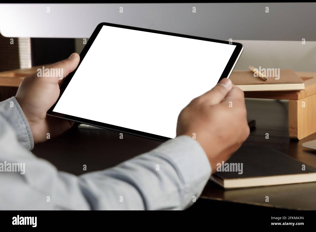 hands holding digital Mock up tablet touch screen device isolated ...