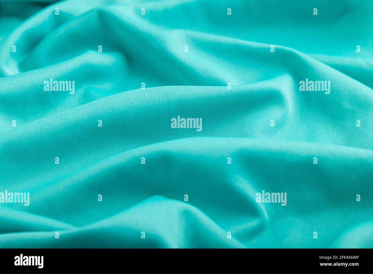 Fragment of silk blue tissue. Side view, natural textile background and ...