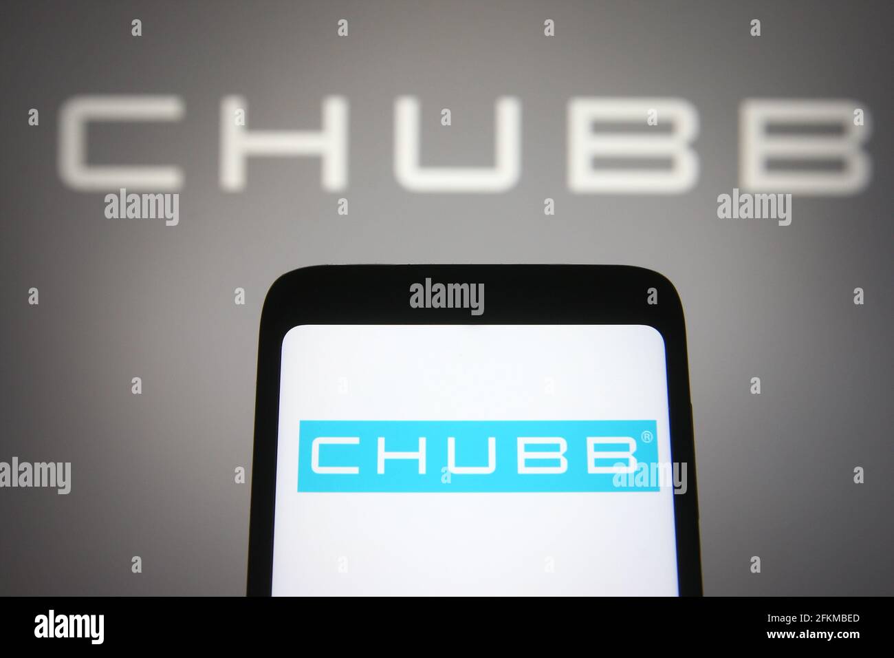 In this photo illustration a Chubb Limited logo of an insurance company ...