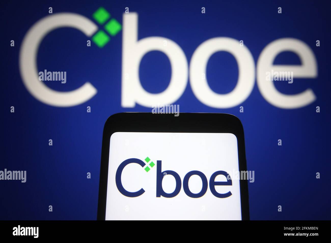 In this photo illustration a Cboe Global Markets logo is seen on a ...