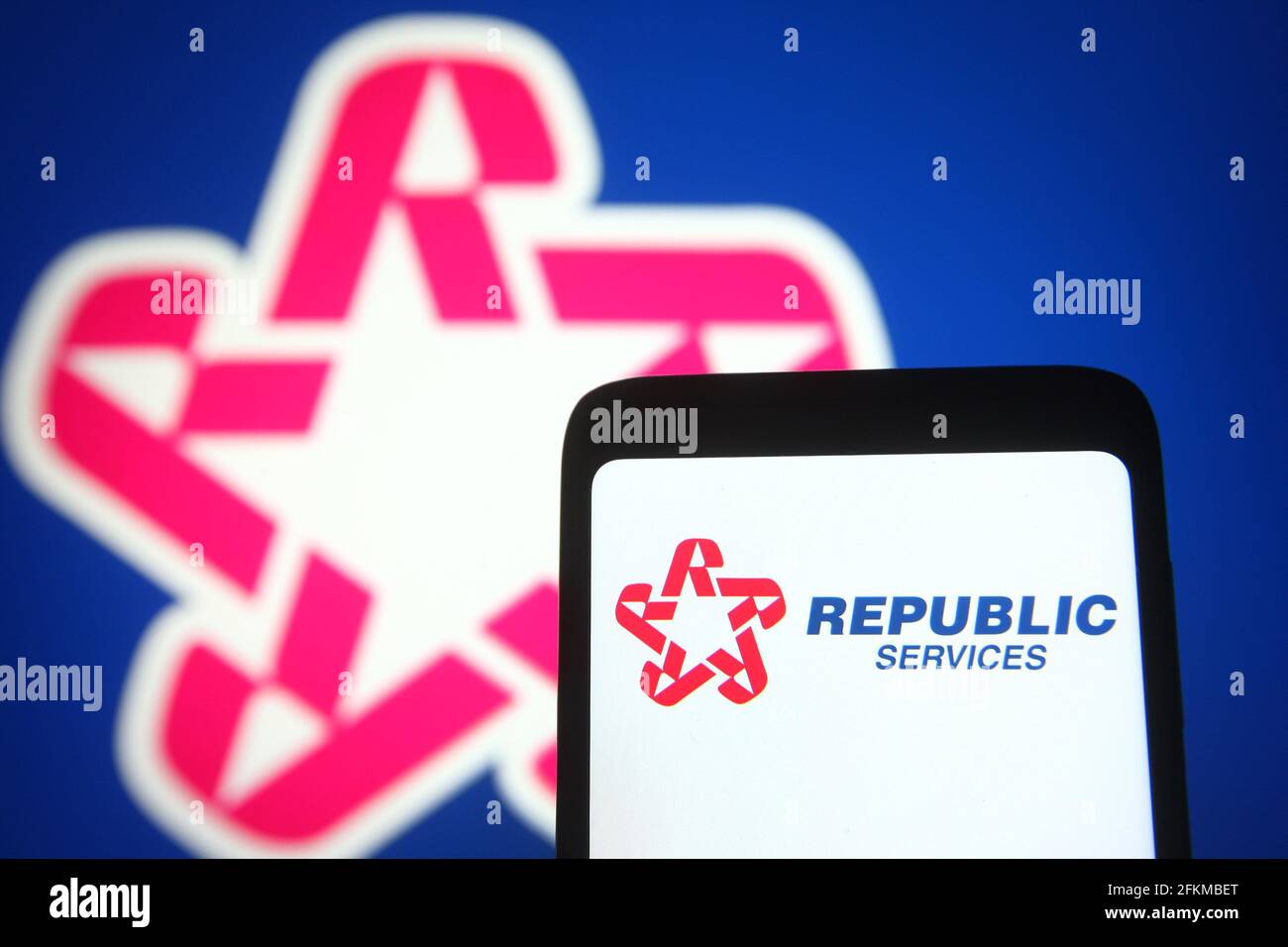 In this photo illustration a Republic Services logo is seen on a ...