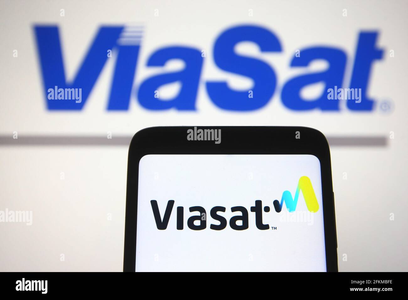 In this photo illustration a Viasat Inc logo of an US communications ...