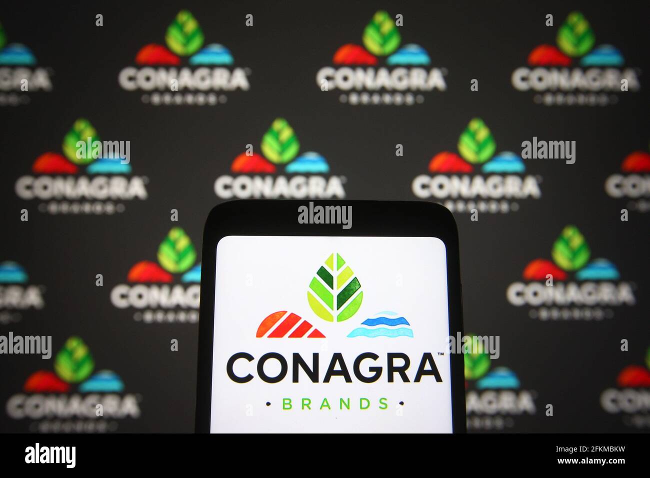 In this photo illustration a Conagra Brands logo is seen on a ...