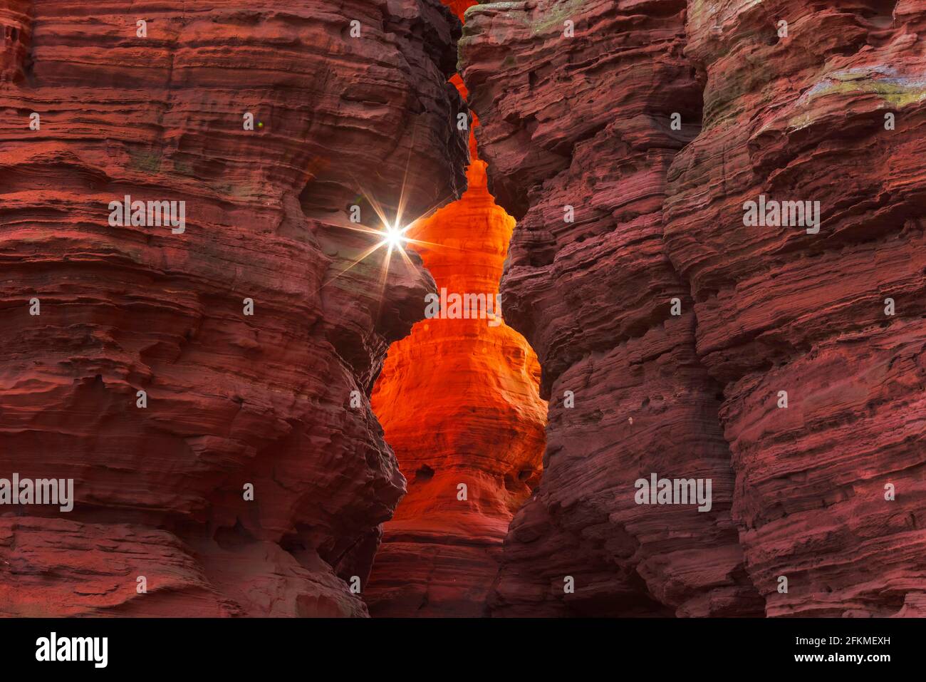 Rock formation of sandstone at light incidence, rock glow, old castle ...