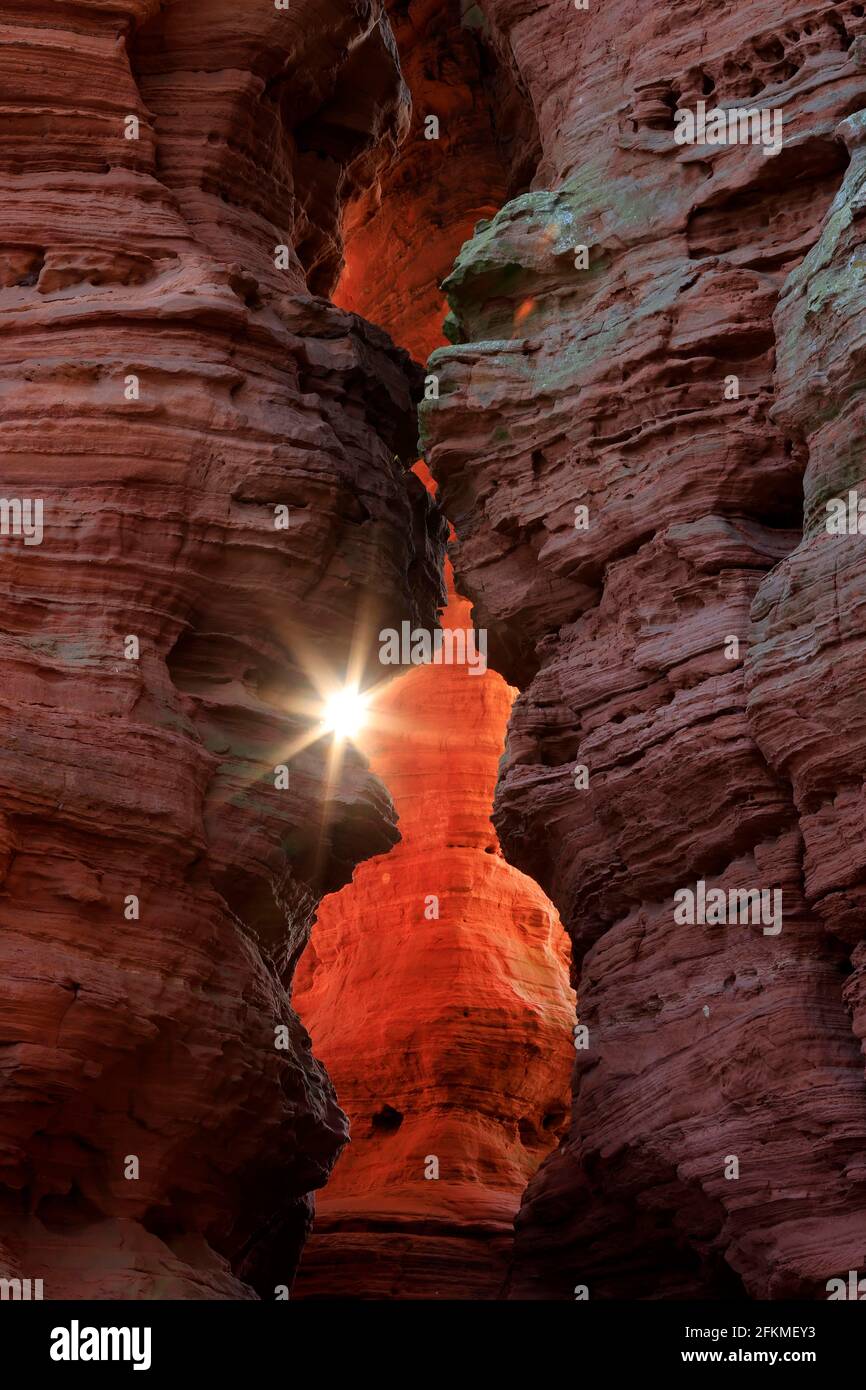 Rock formation of sandstone at light incidence, rock glow, old castle ...