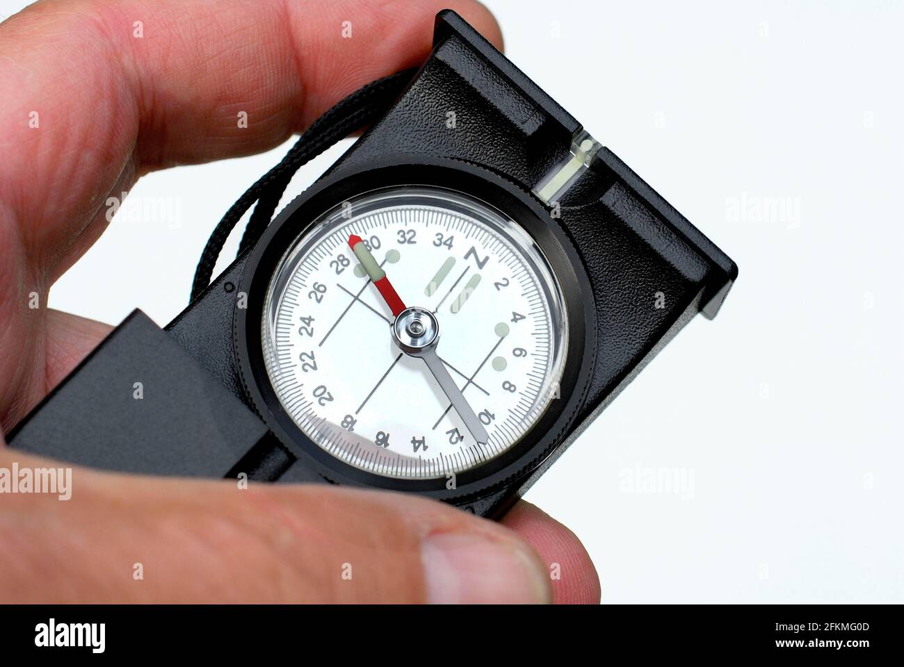 Compass in hand, orientation Stock Photo - Alamy