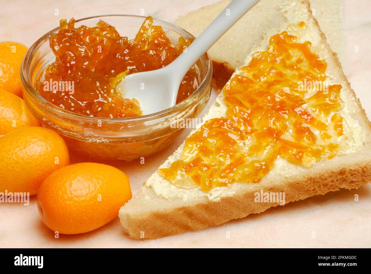 Kumquat-jam (Fortunella) in shell, on toast, -jam, jam, fruit spread ...