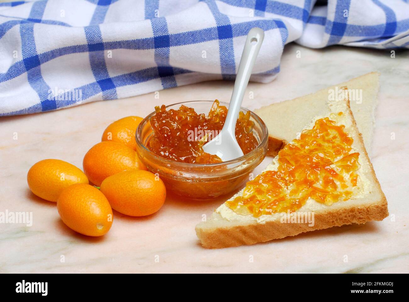 Kumquat-jam (Fortunella) in shell, on toast, -jam, jam, fruit spread ...
