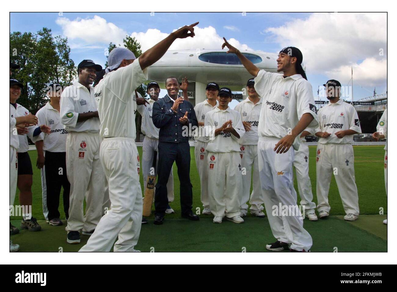 Cricket ledgend Brian Lara is entertained by members of the L.A. based ...