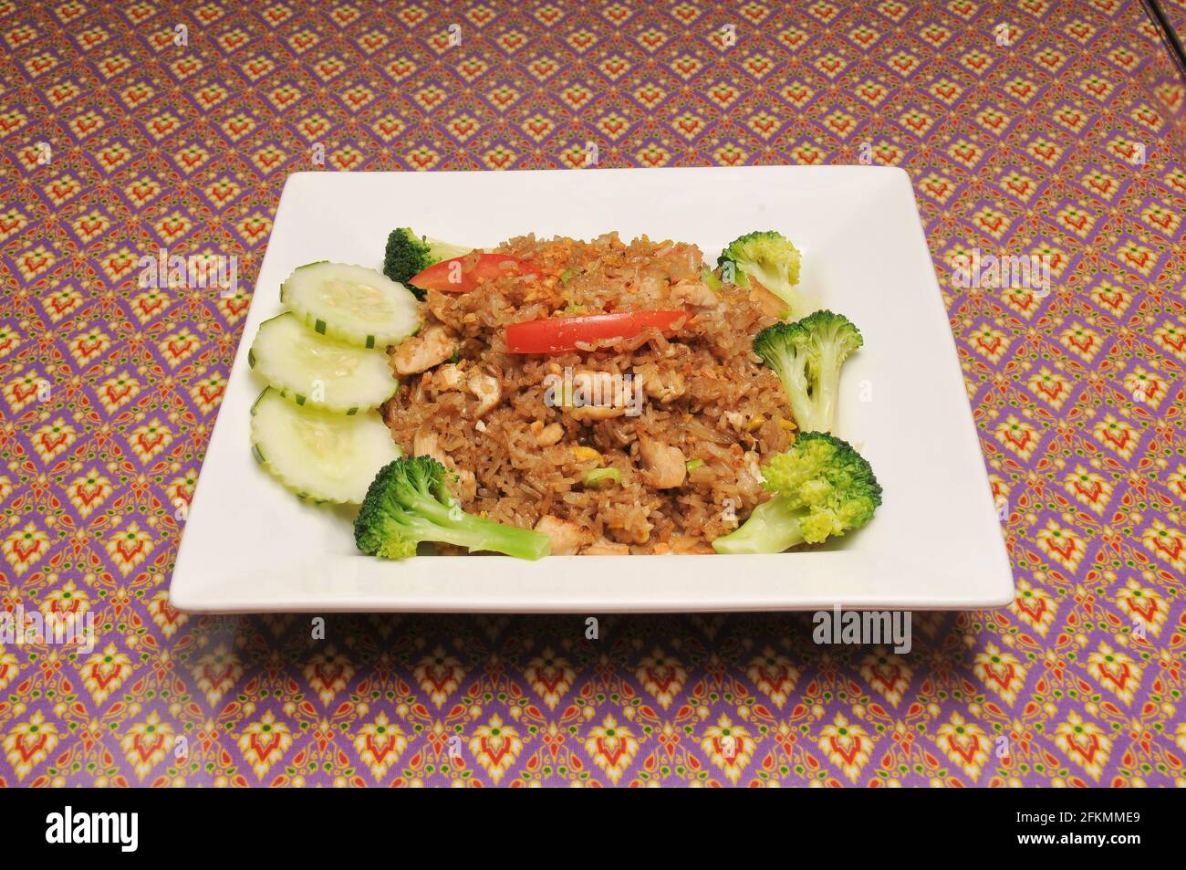 Authentic Asian food known as chicken fried rice Stock Photo - Alamy