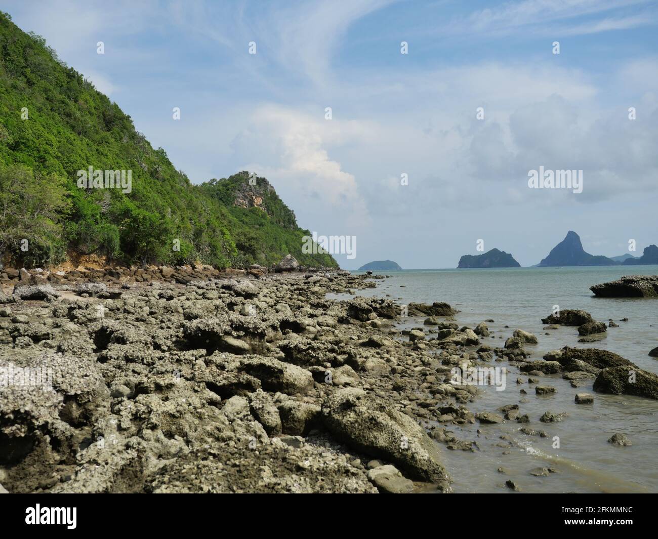 Rocky reefs with sand and mud in water phenomenon at low tide, Green ...