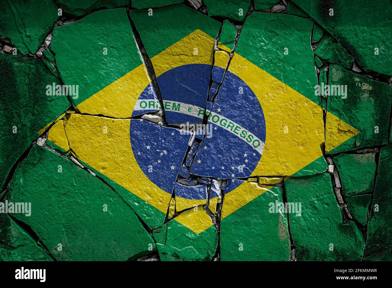 National flag of Brazil depicting in paint colors on an old stone wall ...
