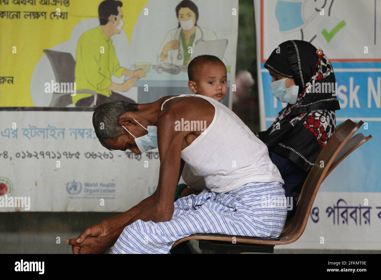 People wait to get admit at Dhaka Medical College Hospital, in Dhaka ...