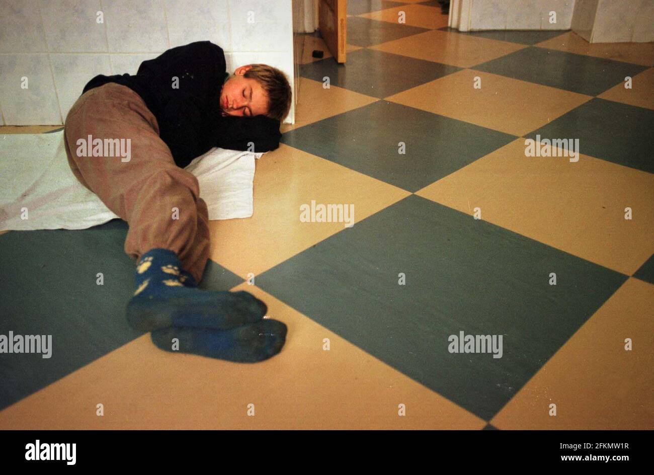 in from the streets a romanian boy sleeps on the floor of a centre for ...