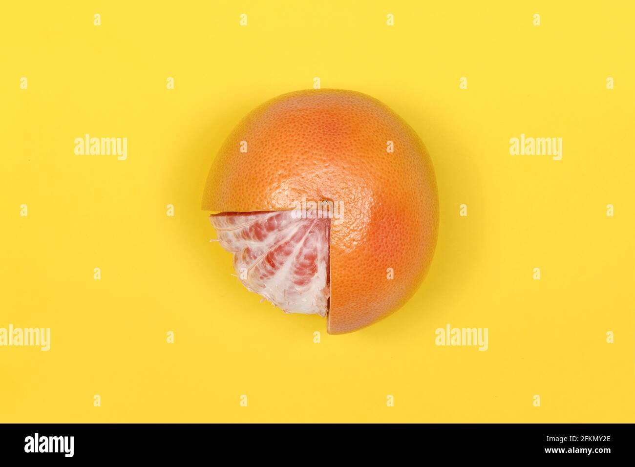 Grapefruit isolated on yellow background. High resolution photo. Full ...