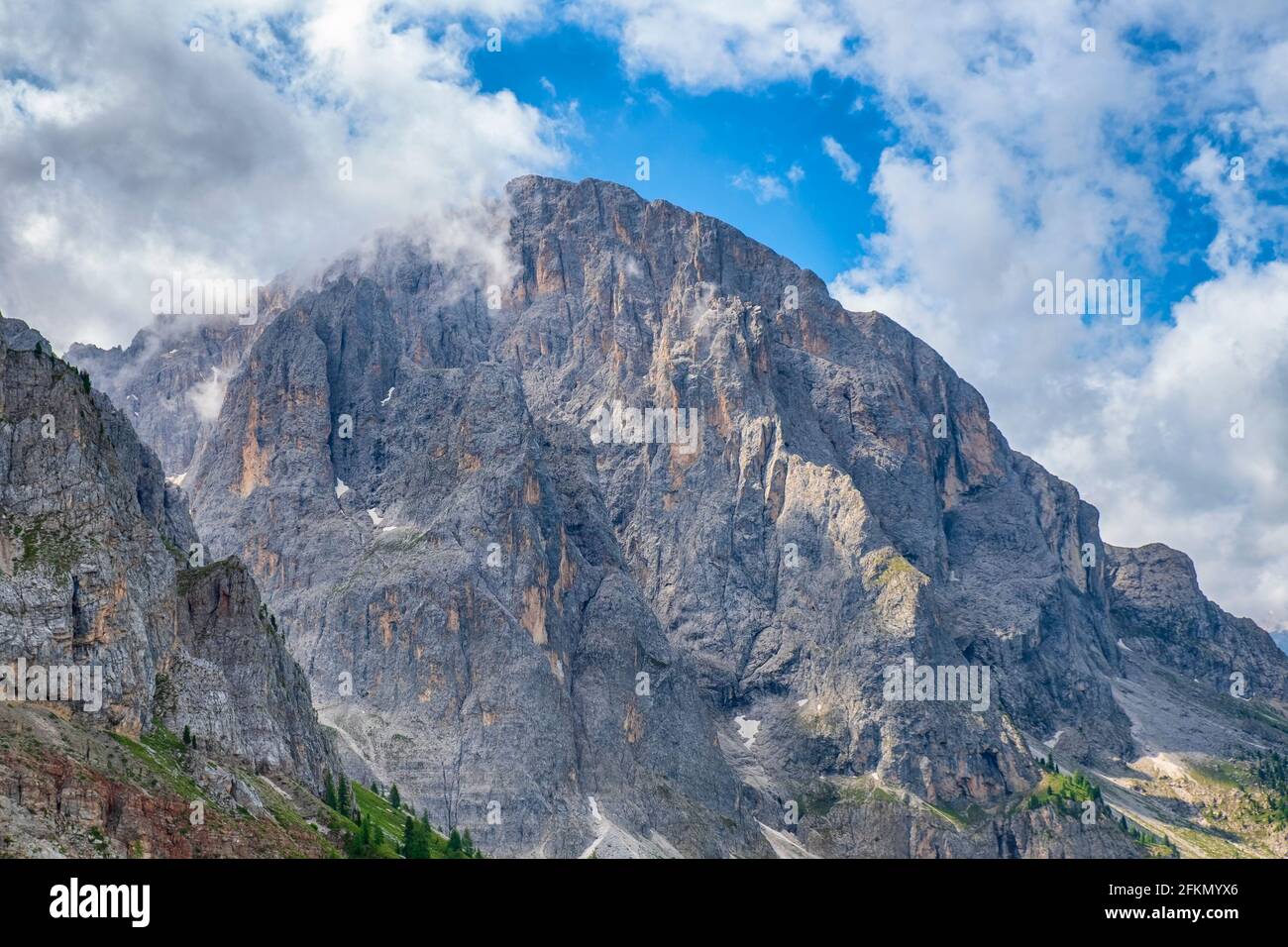 High rock walls on a mountain peak in the Dolomites Stock Photo - Alamy