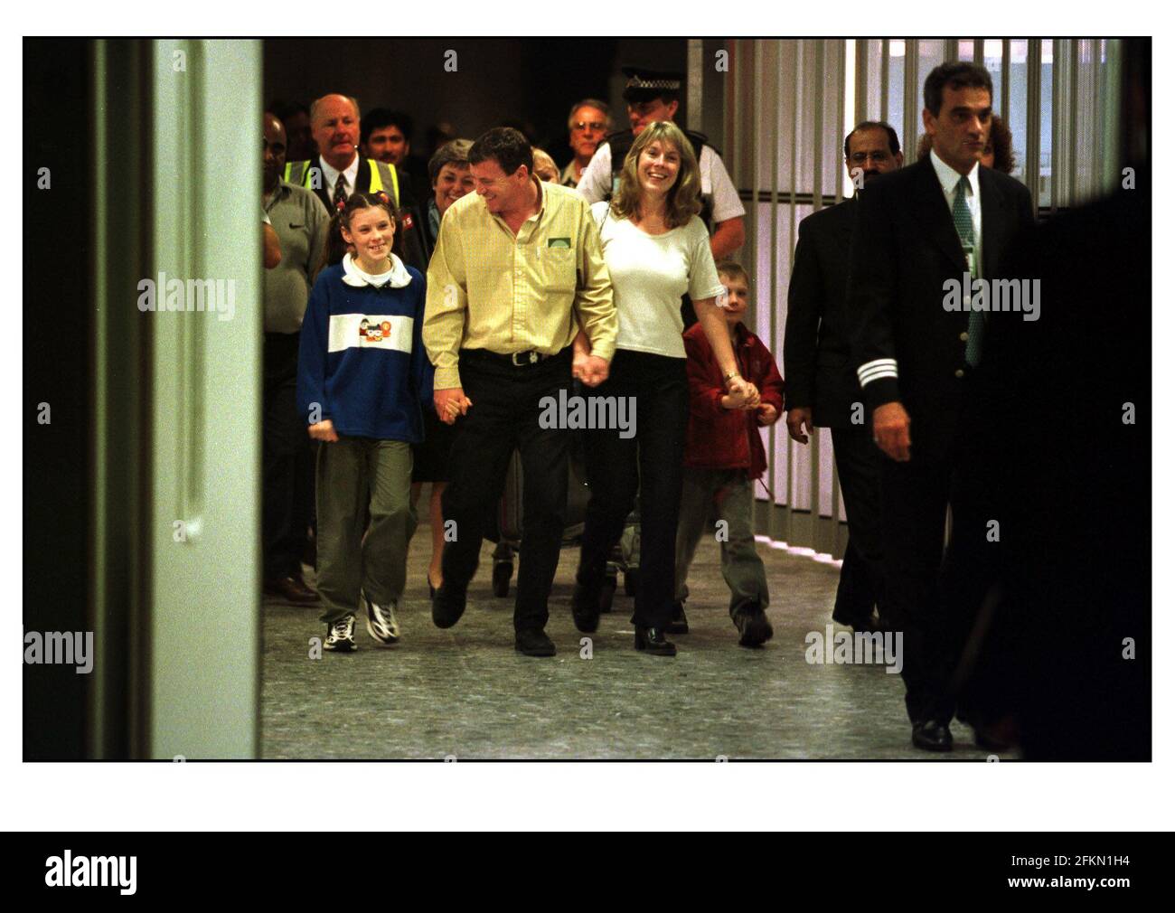 The Fouler family arrive home at Heathrow airport October 2000 they ...