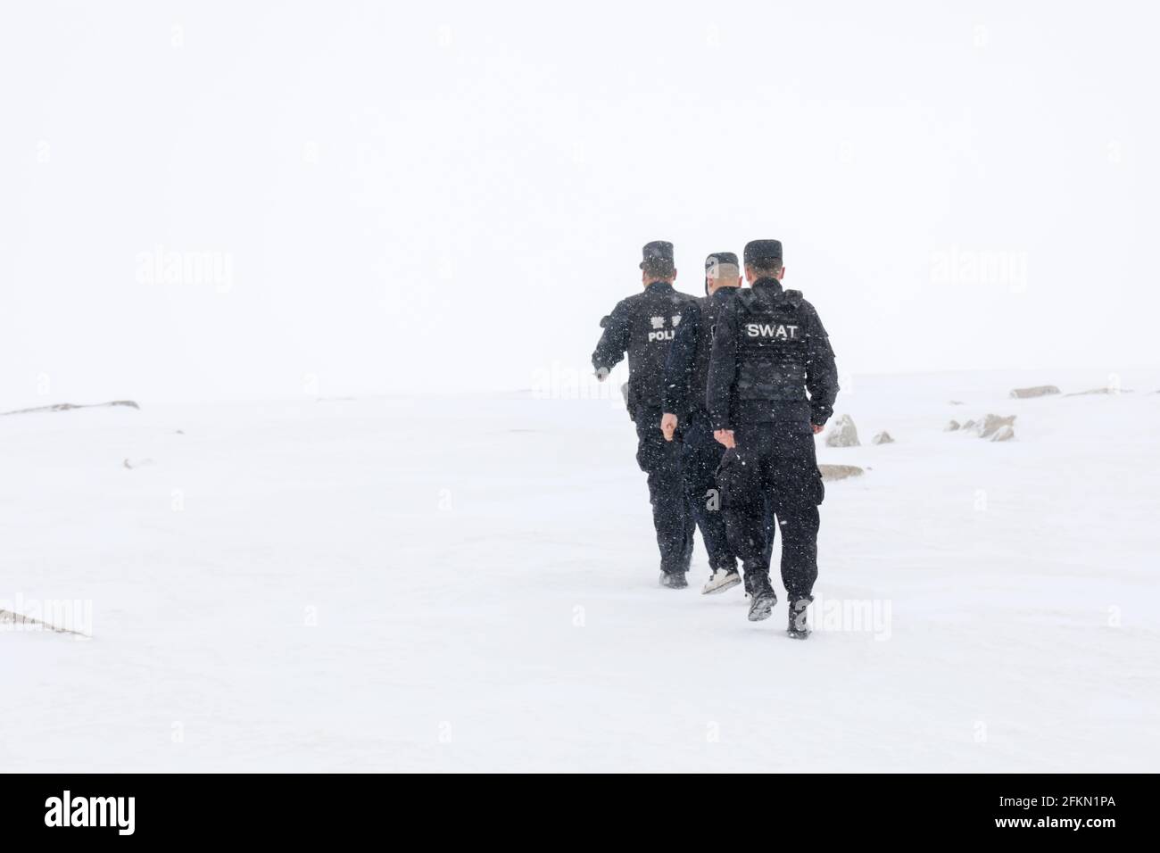 ALTAY, CHINA - MAY 2, 2021 - Chinese border police patrol in snow at ...