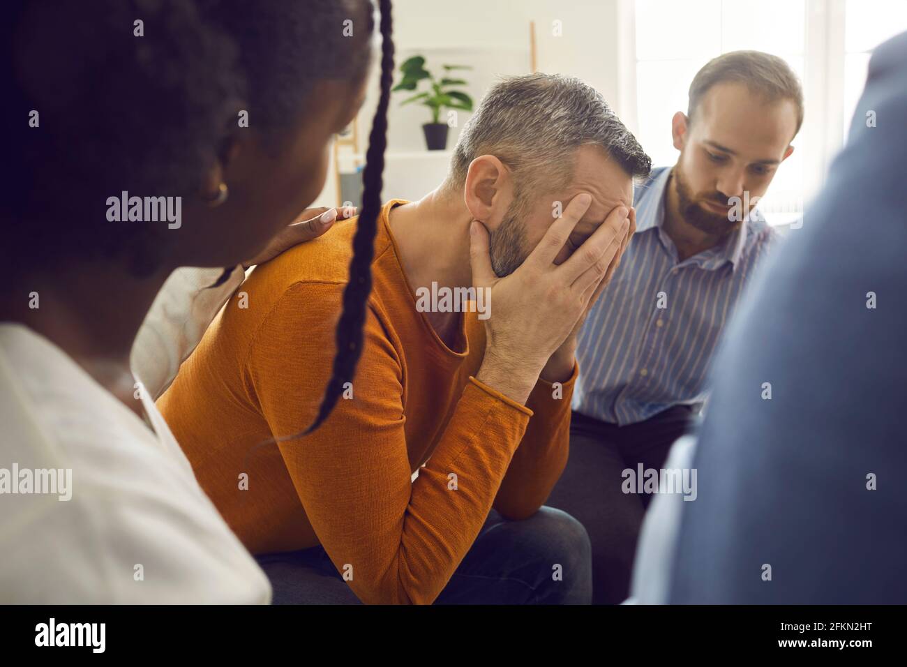 Grief comforting hi-res stock photography and images - Alamy
