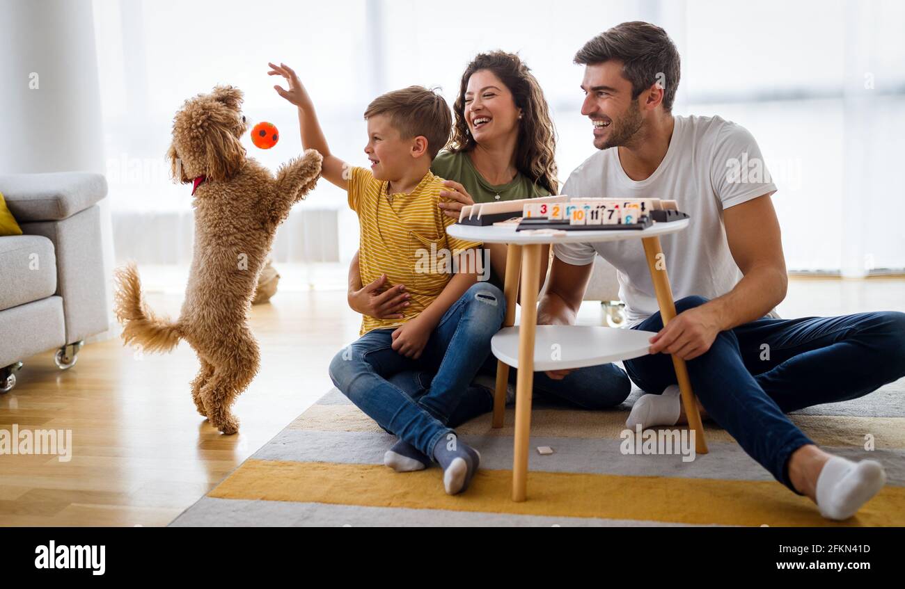 Happy young family having fun together at home. Happy childhood concept ...