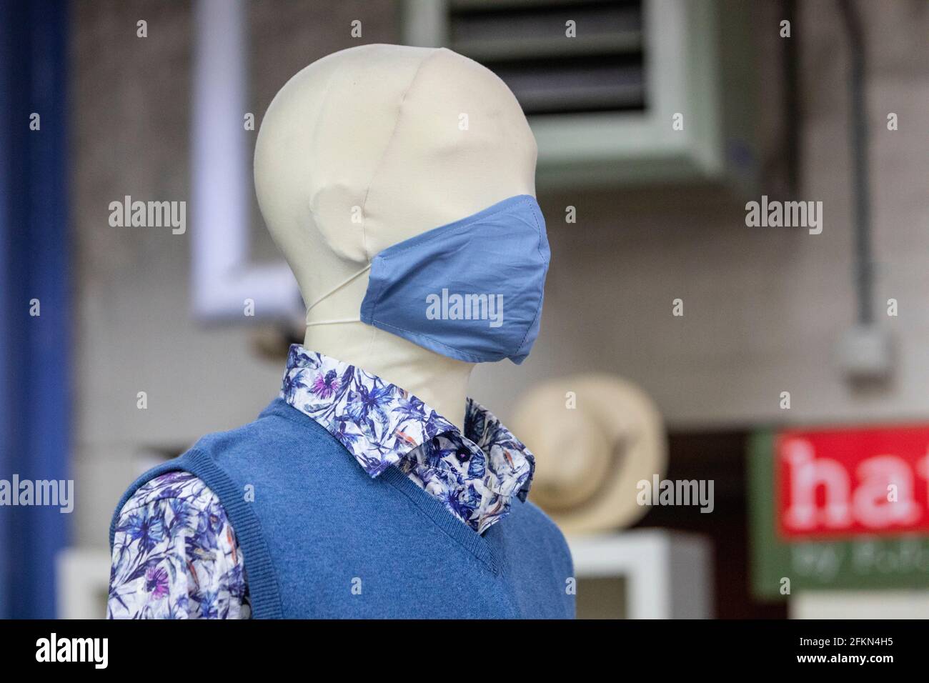 A shop mannequin wearing a face mask Stock Photo - Alamy