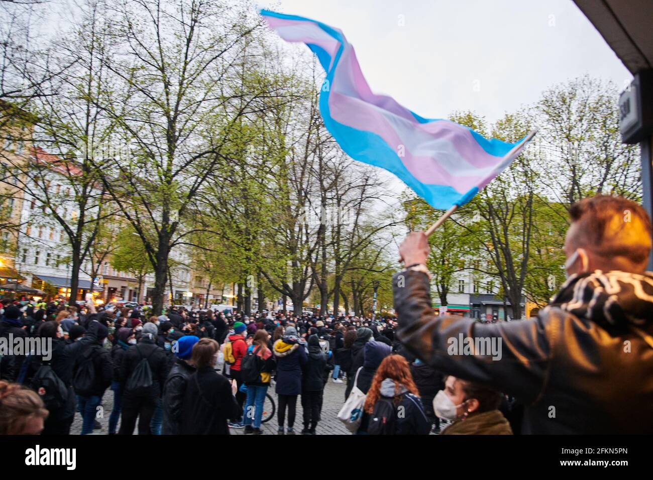 Berlin, Germany. 30th Apr, 2021. A demonstrator waves a transgender ...