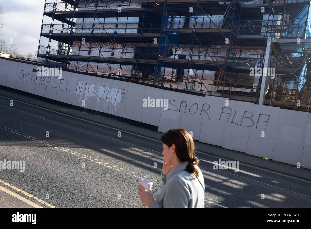 'Gon Yersel Nicola' and 'Saor Alba' graffiti on a building site in ...