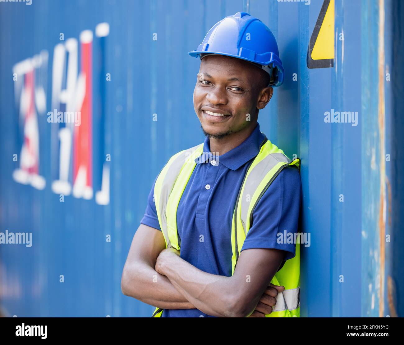 Portrait transportation man engineering a helmet logitics shipping at ...