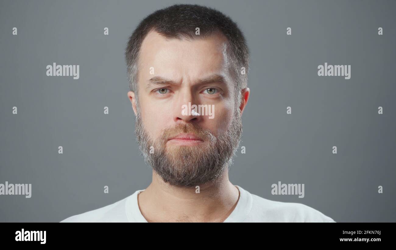 Portrait bearded frowned man hi-res stock photography and images - Alamy