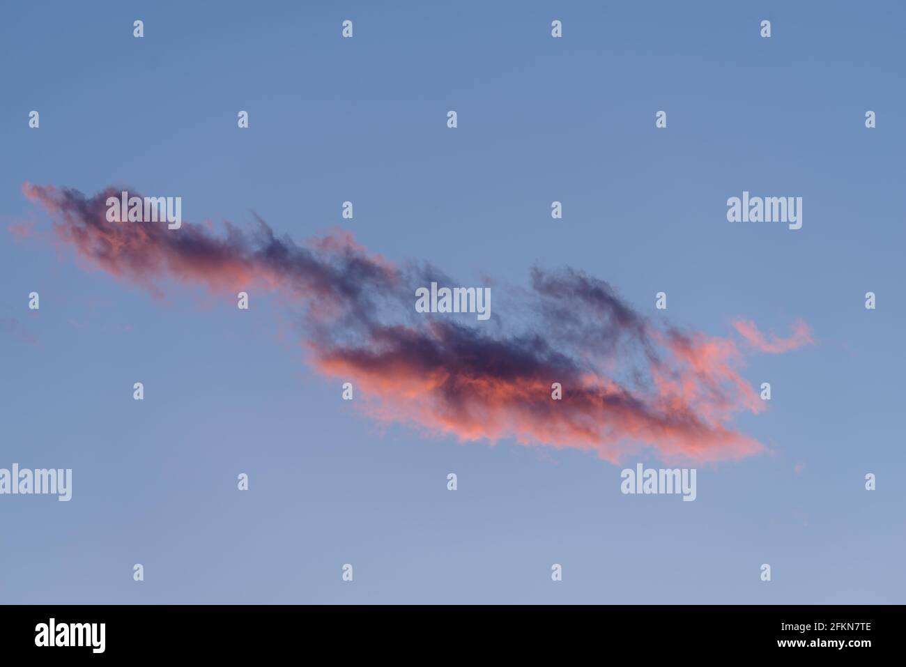 Small cumulus humilis cloud at sunset Stock Photo - Alamy
