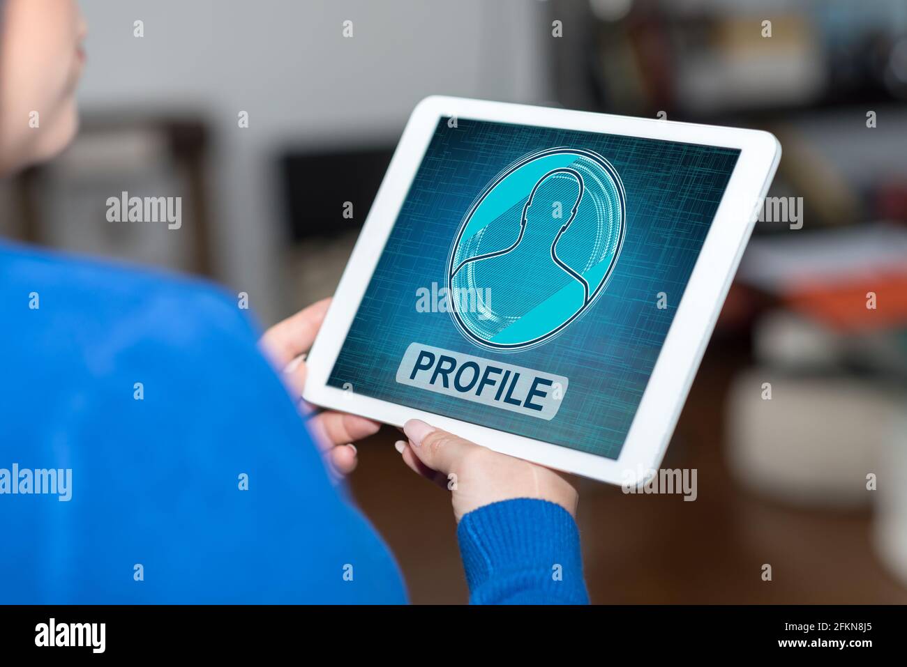 Tablet screen displaying a profile concept Stock Photo - Alamy