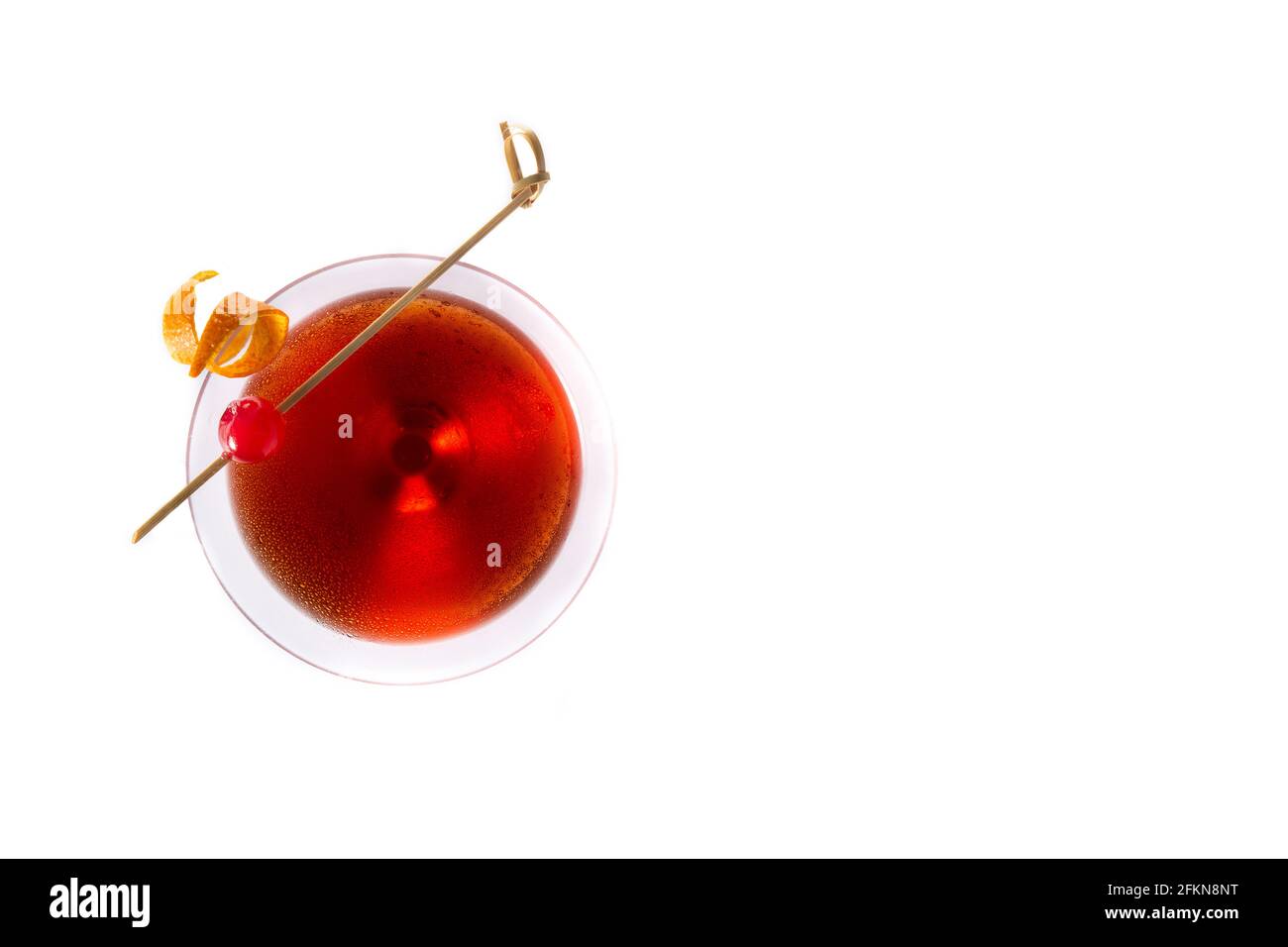 Traditional Manhattan cocktail with cherry isolated on white background ...