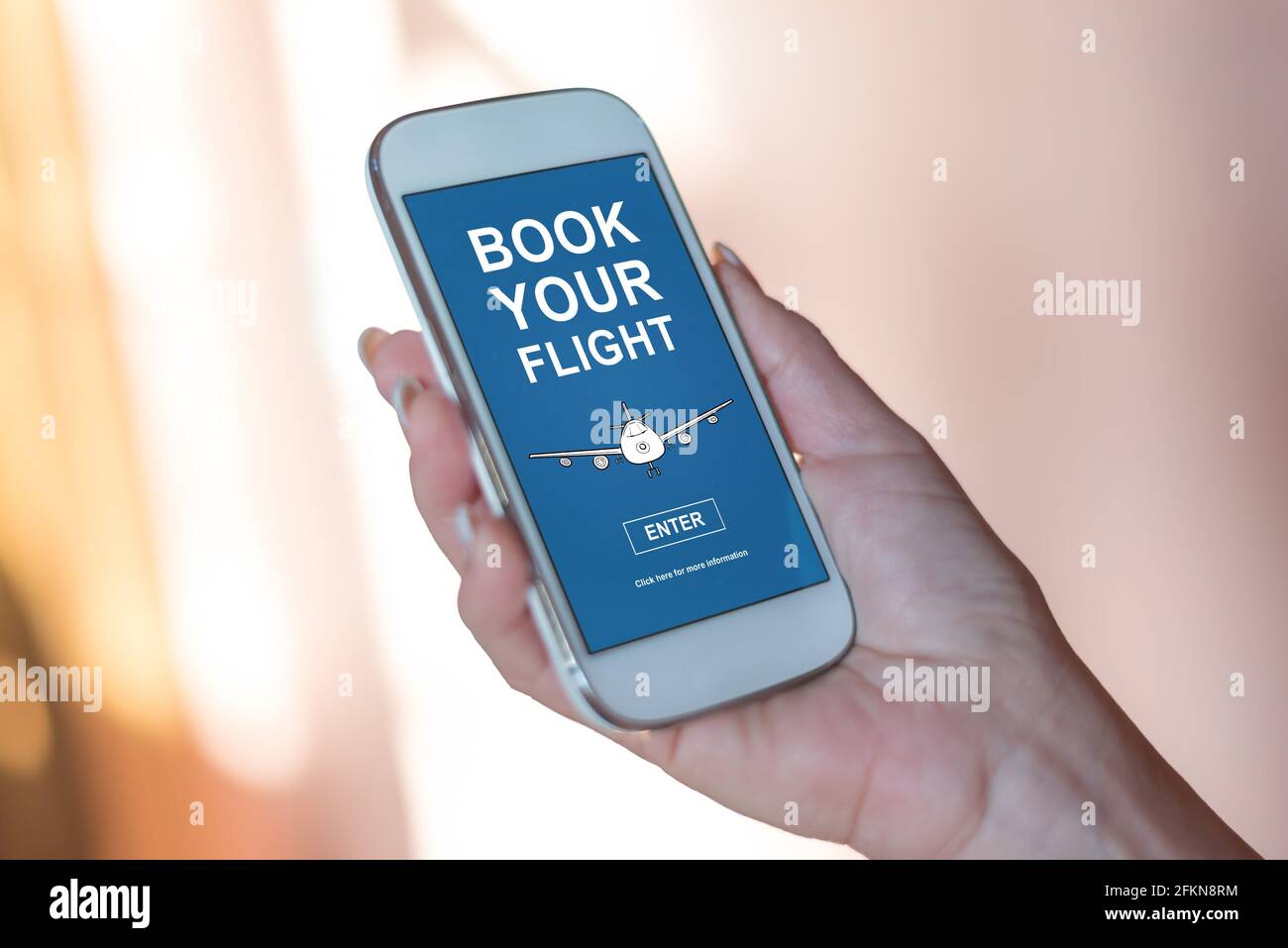 Smartphone screen displaying a flight booking concept Stock Photo - Alamy