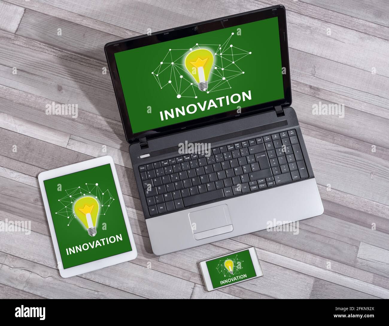Innovation concept shown on different information technology devices ...