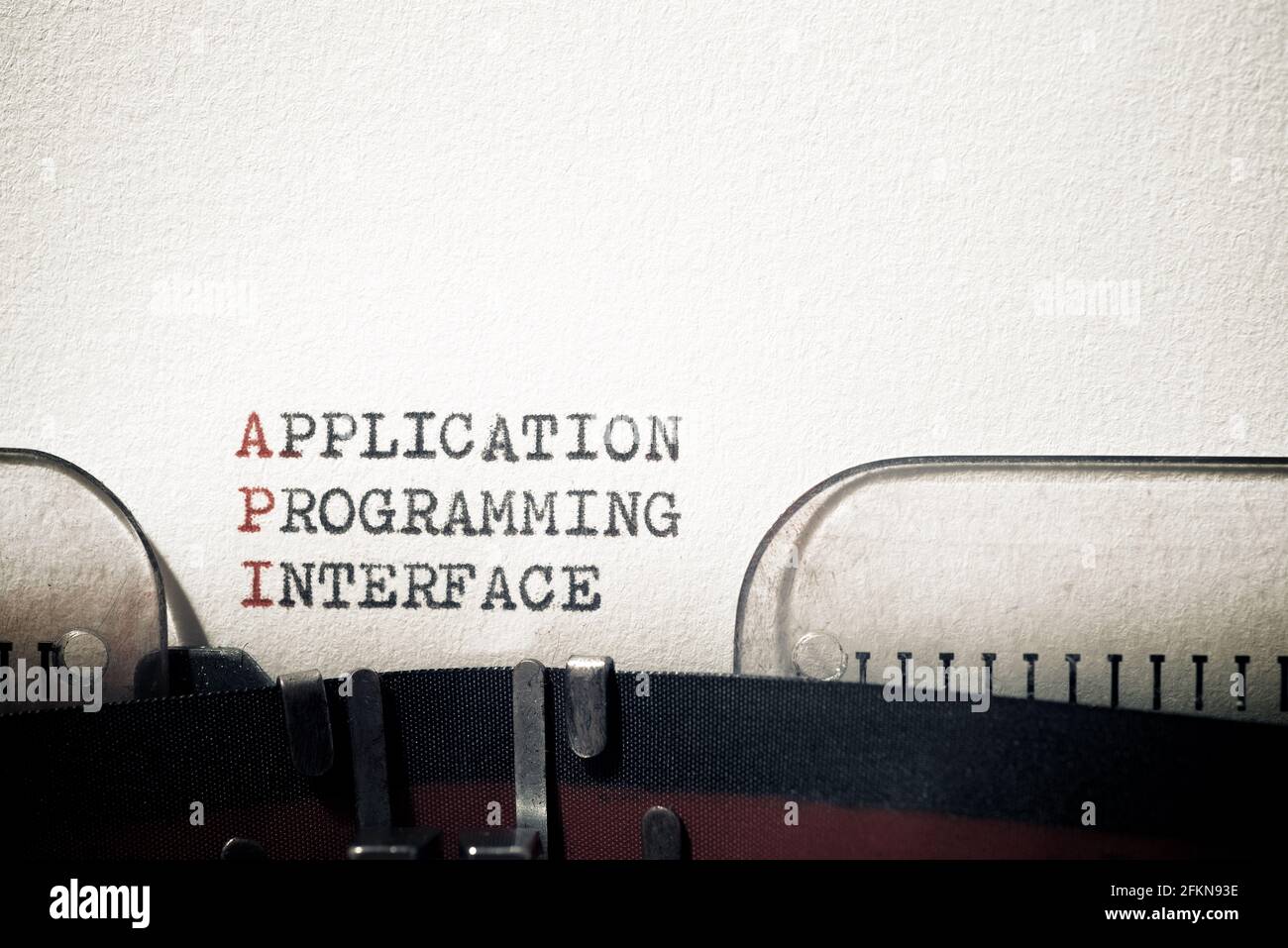 Application programming interface phrase written with a typewriter ...