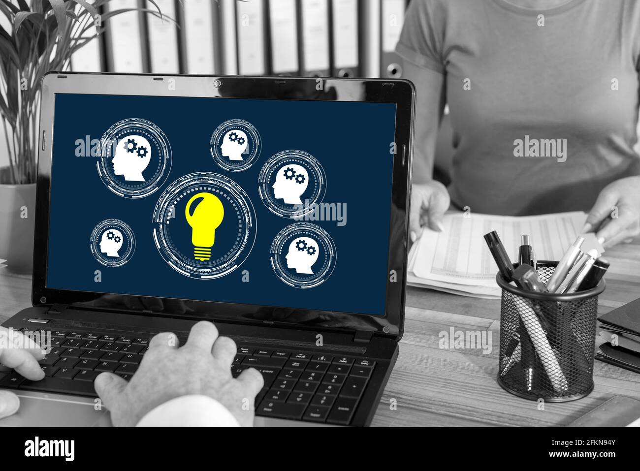 Laptop screen with teamwork idea concept Stock Photo - Alamy