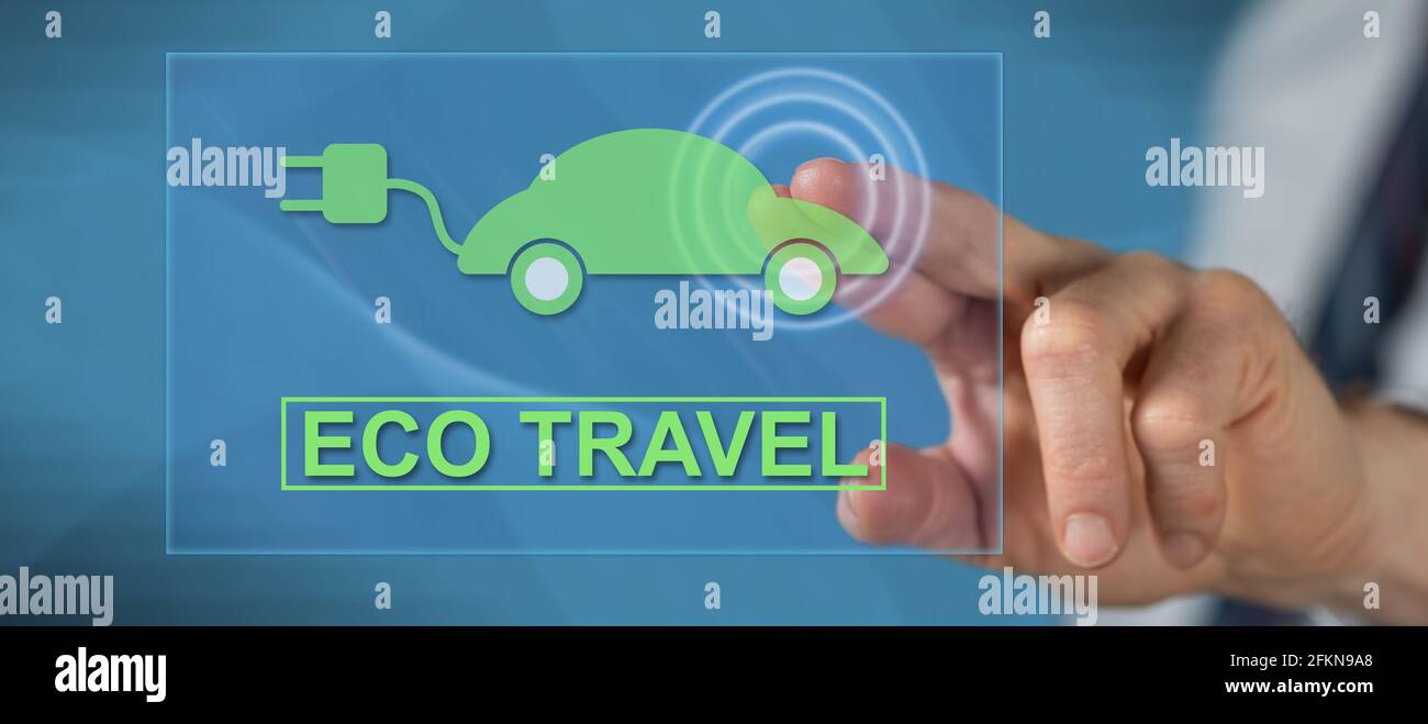 Man touching an eco travel concept on a touch screen with his finger ...