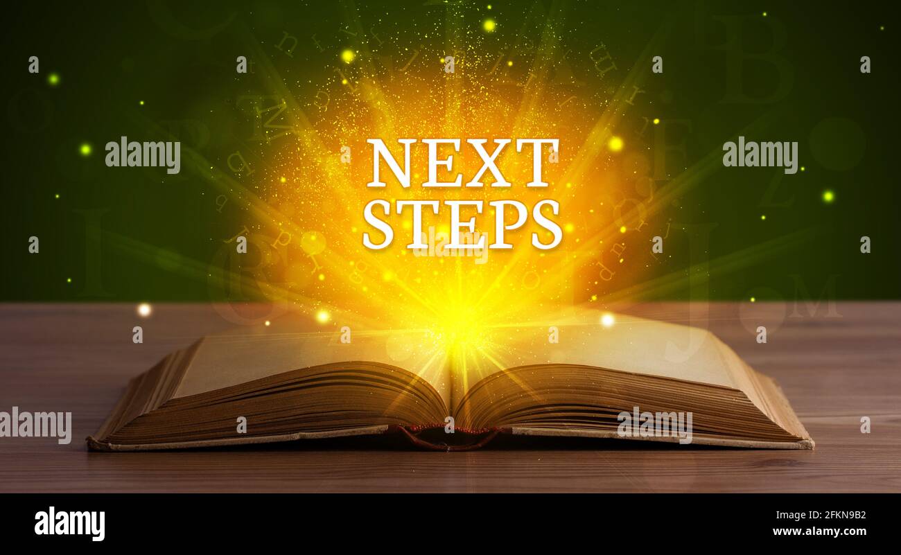 Educational inscription coming out from an open book Stock Photo - Alamy