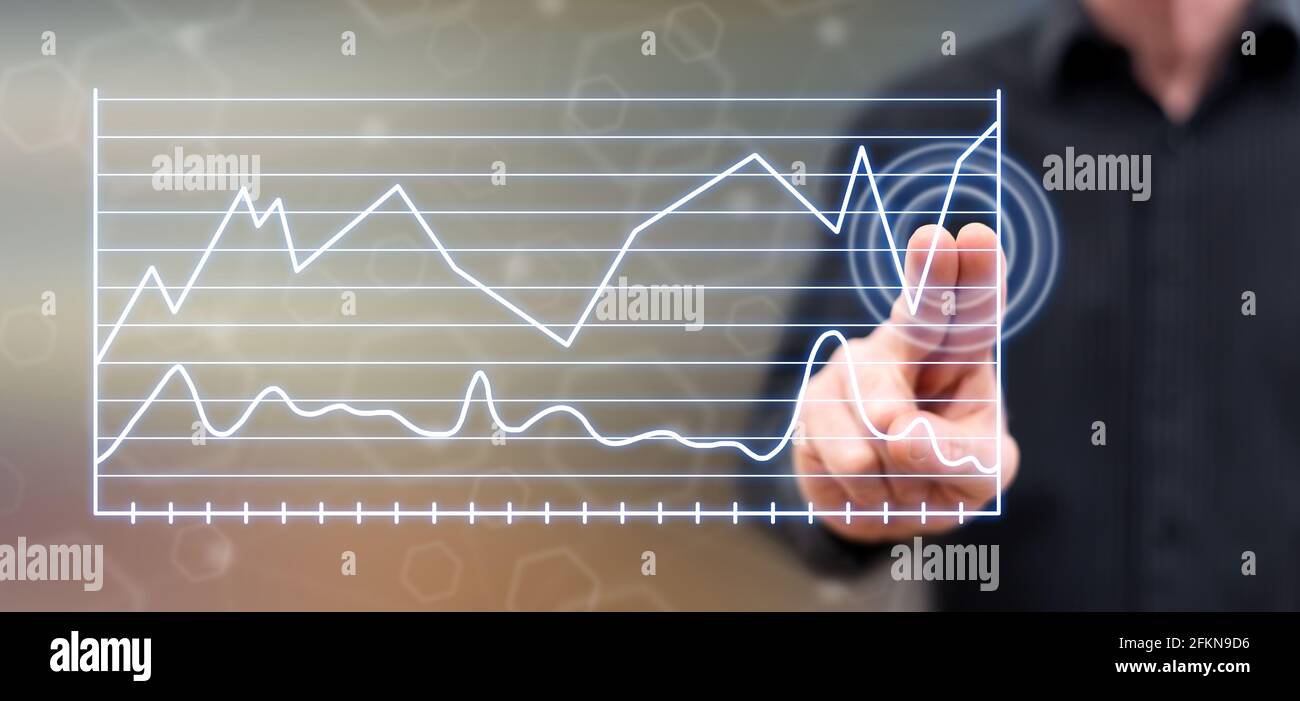 Man touching business charts on a touch screen with his fingers Stock ...