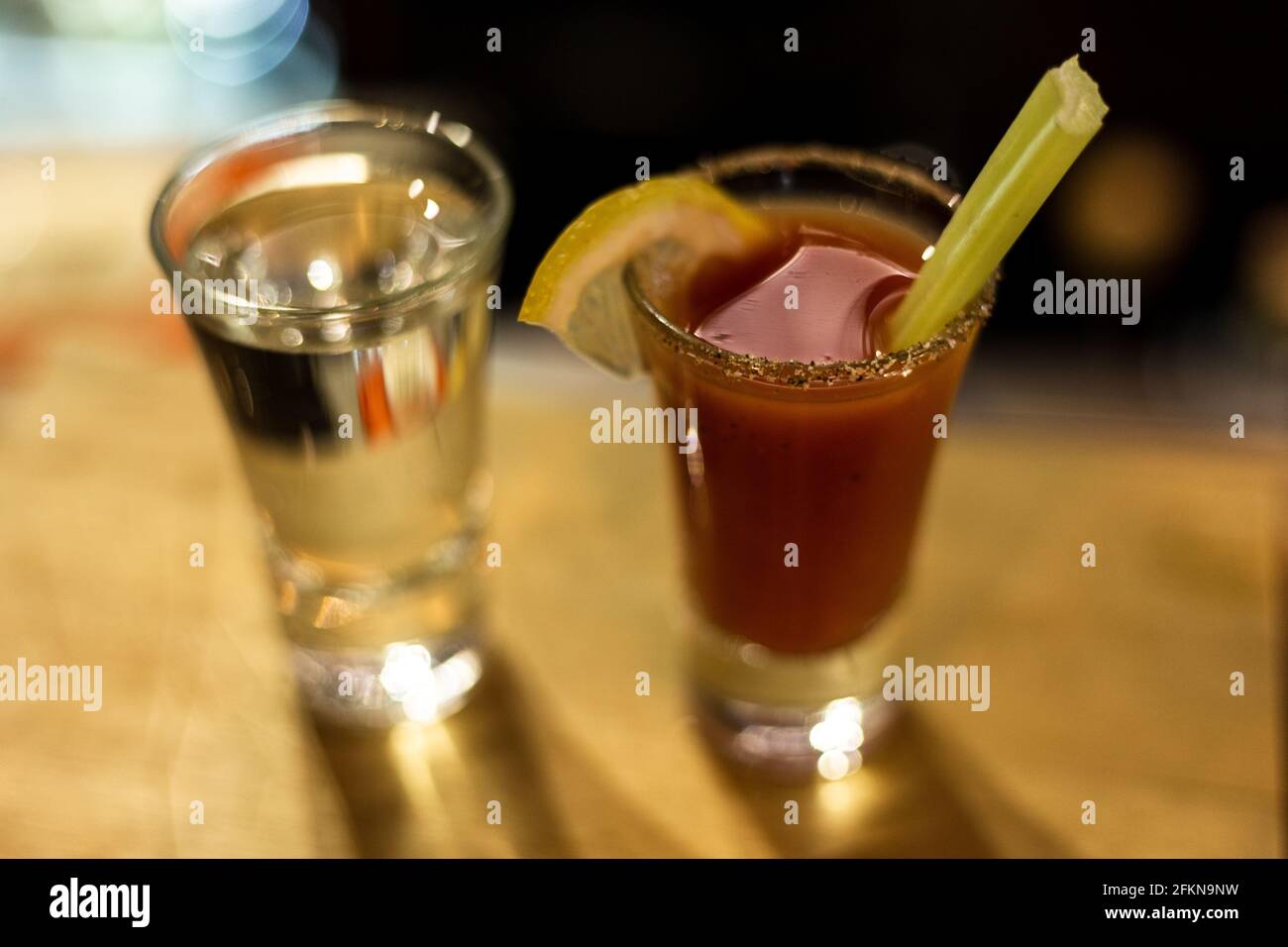 Cocktail in a glass with Tobasco and alcohol. Sambuca Stock Photo - Alamy