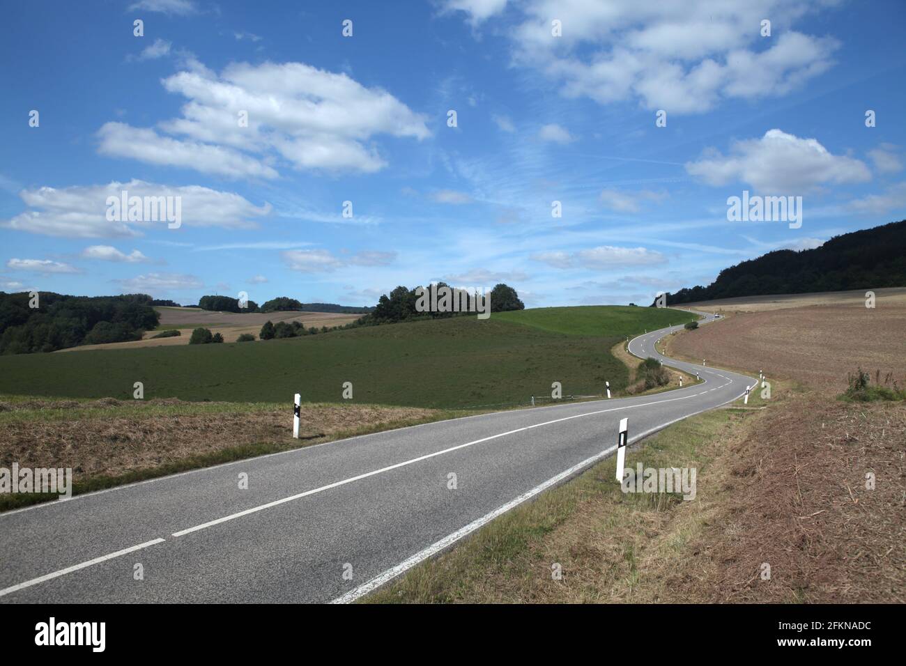 Road in the landscape Stock Photo - Alamy