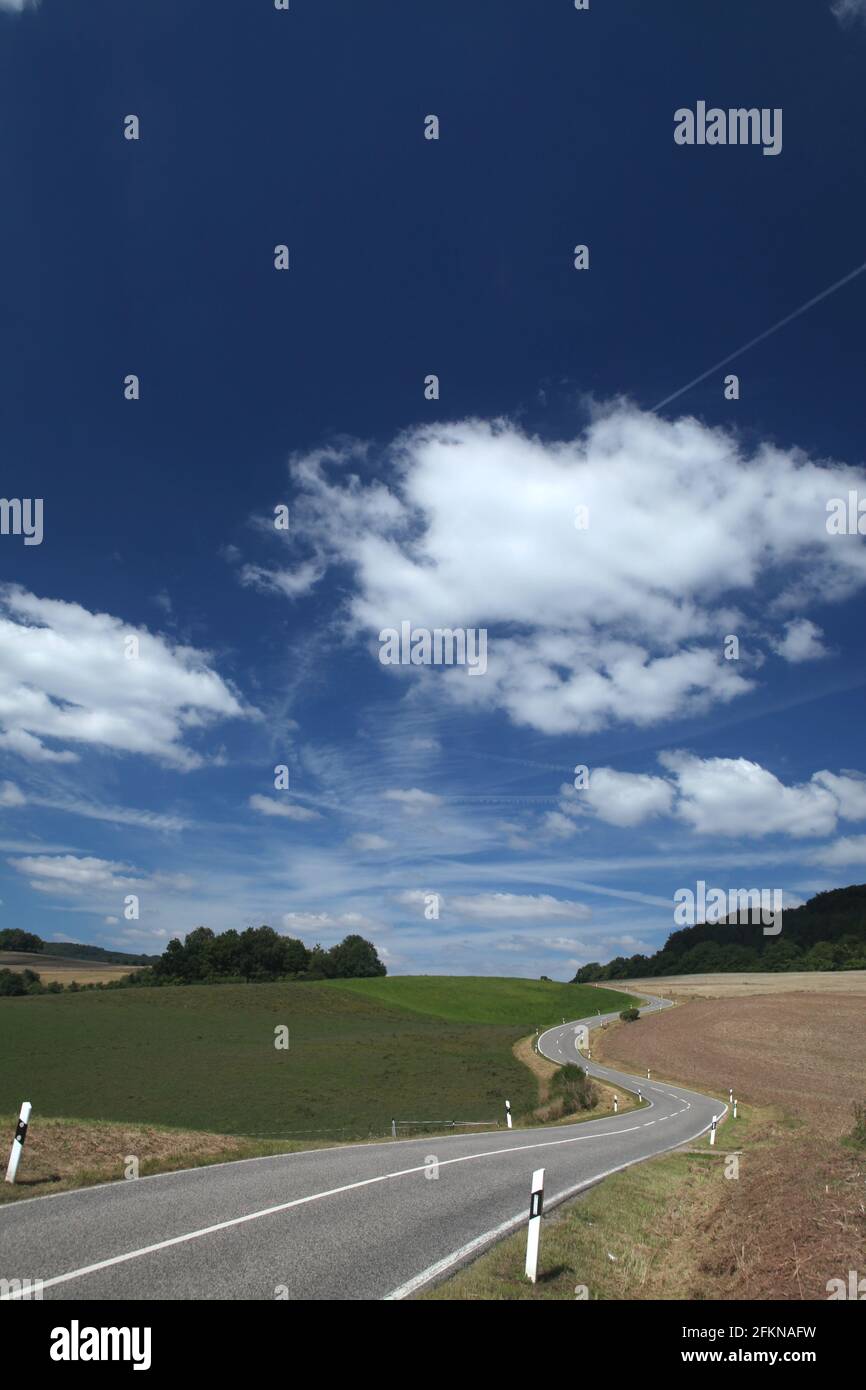 Road in the landscape Stock Photo - Alamy