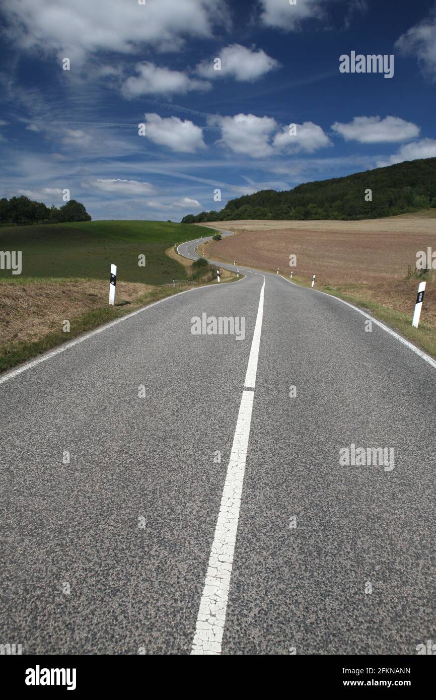 Road in the landscape Stock Photo - Alamy