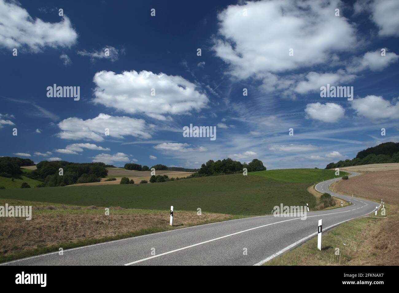 Road in the landscape Stock Photo - Alamy