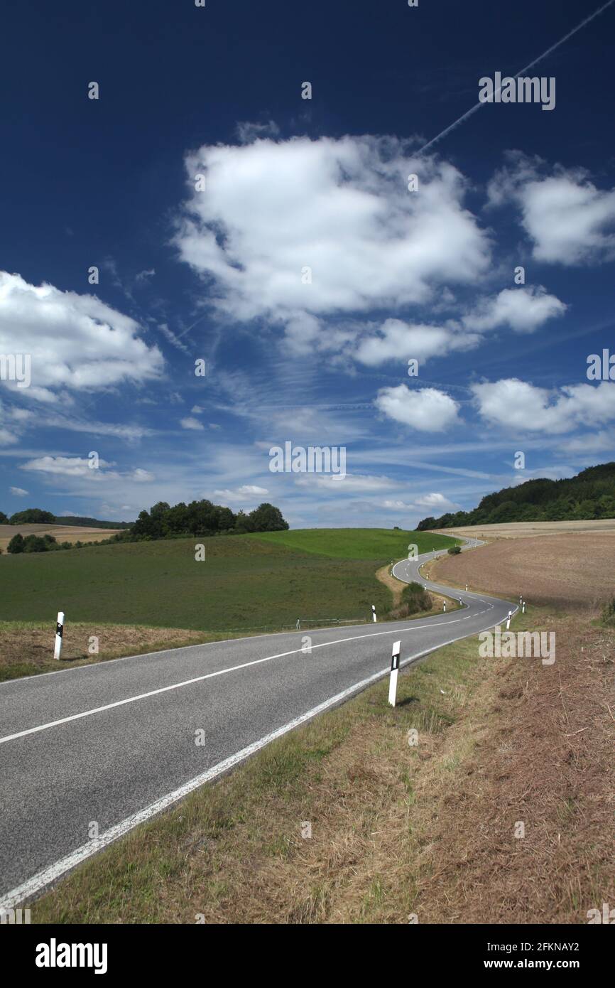 Road in the landscape Stock Photo - Alamy
