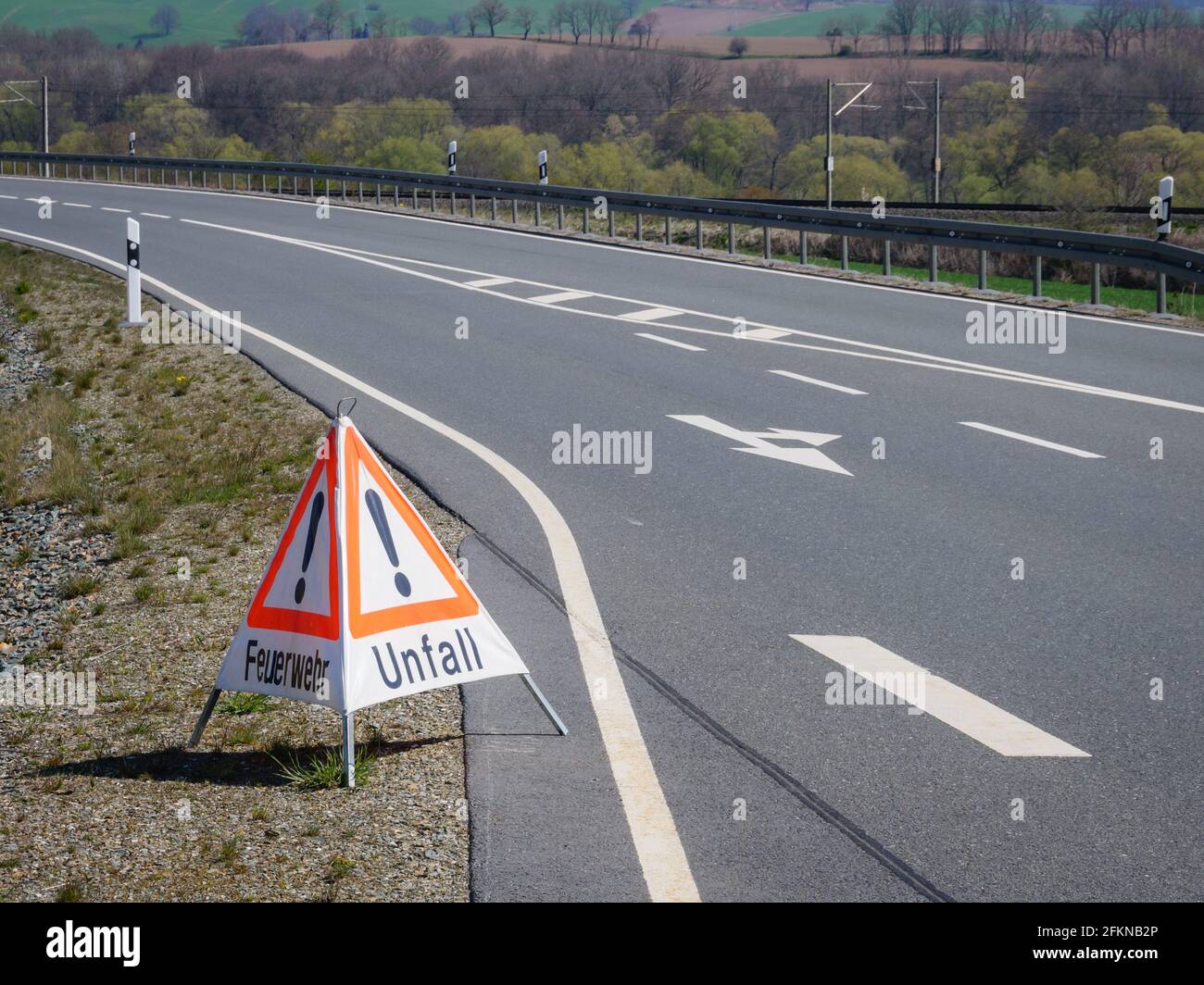 Caution traffic accident sign on a country road in german Stock Photo ...