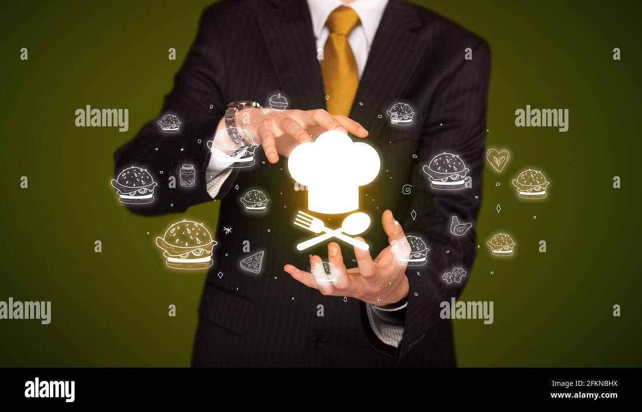 Hand holding food related icons Stock Photo - Alamy