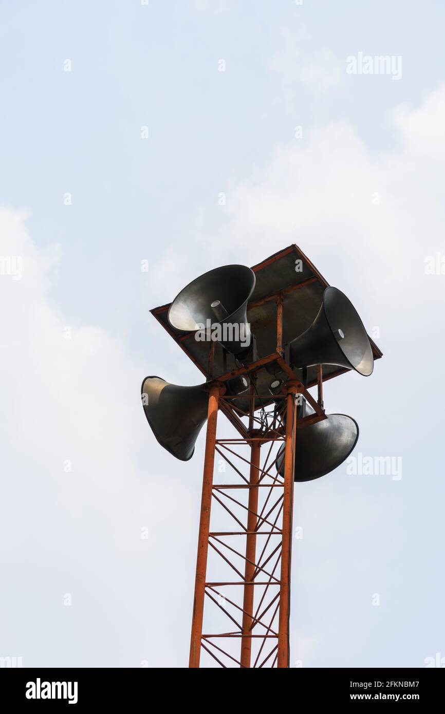 Broadcast or megaphone tower for the announcement with blue sky and ...
